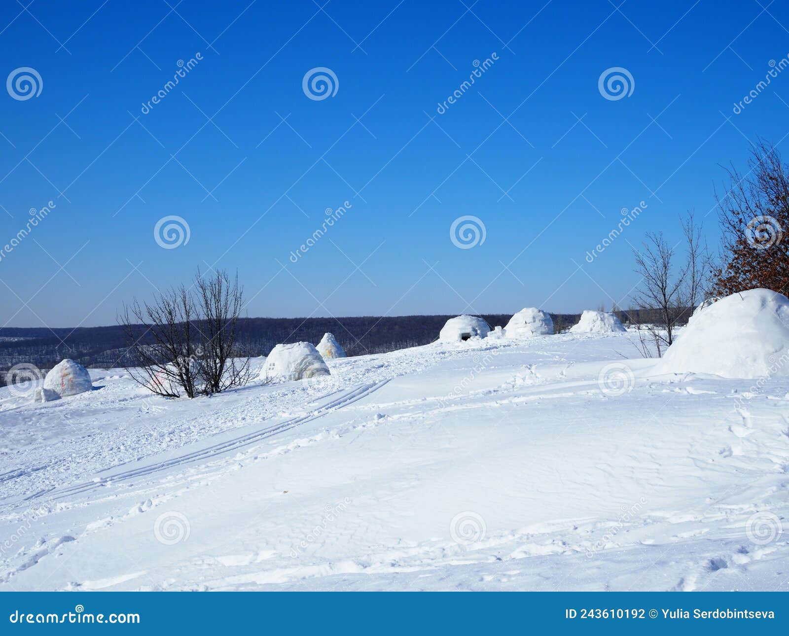 Igloo and Snow Shelter in High Snowdrift with Mountains Peaks on ...