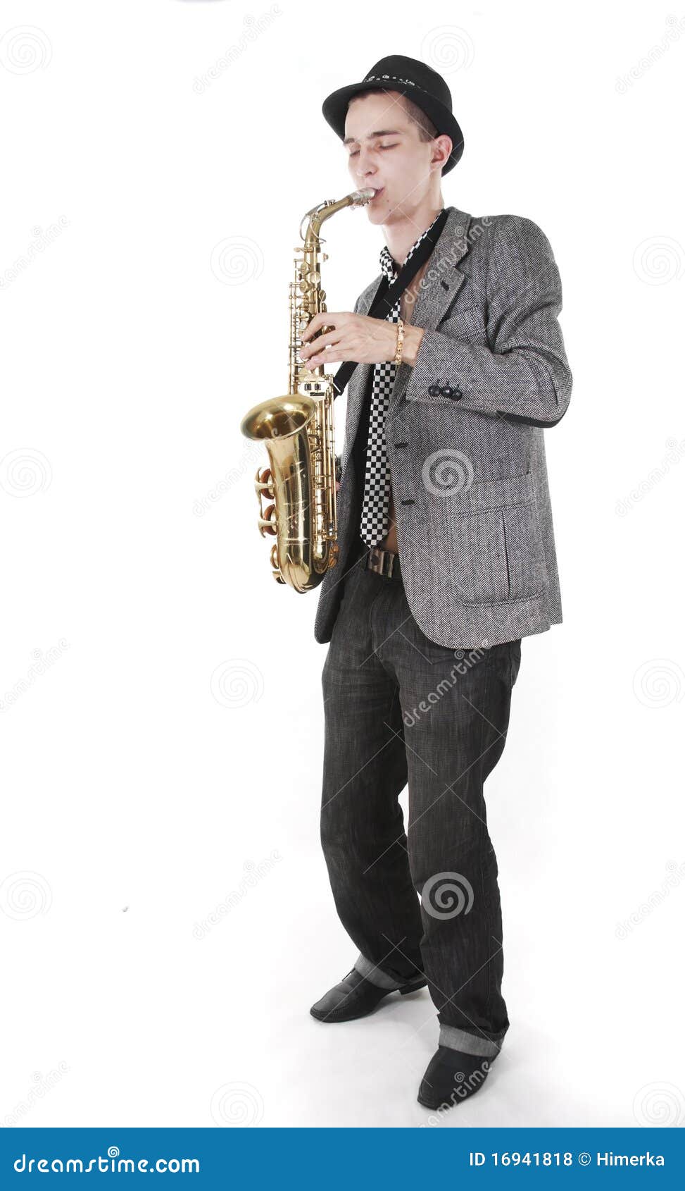 Il giovane jazzman fotografia stock. Immagine di cappello - 16941818