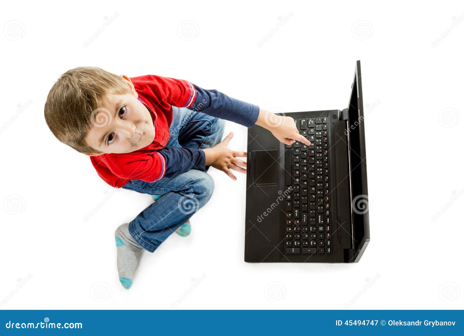 Il Ragazzo Che Indica Il Computer Portatile Immagine Stock - Immagine ...