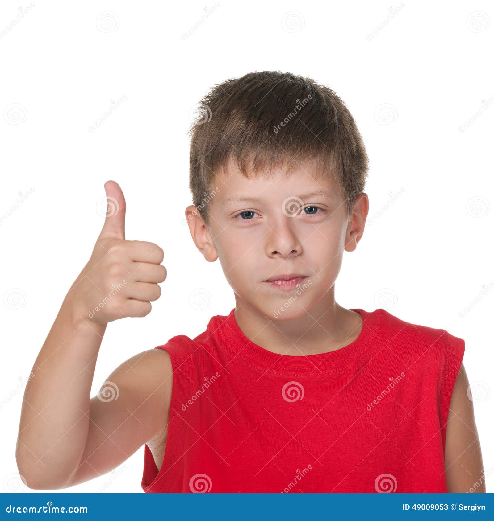 Il Ragazzo Sorridente Tiene Il Suo Pollice Su Immagine Stock - Immagine ...