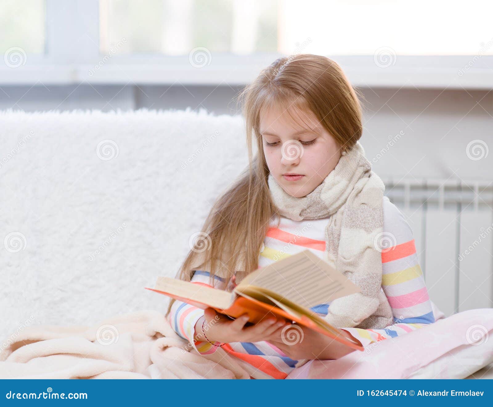 Ill girl reading a book stock photo. Image of face, high - 162645474