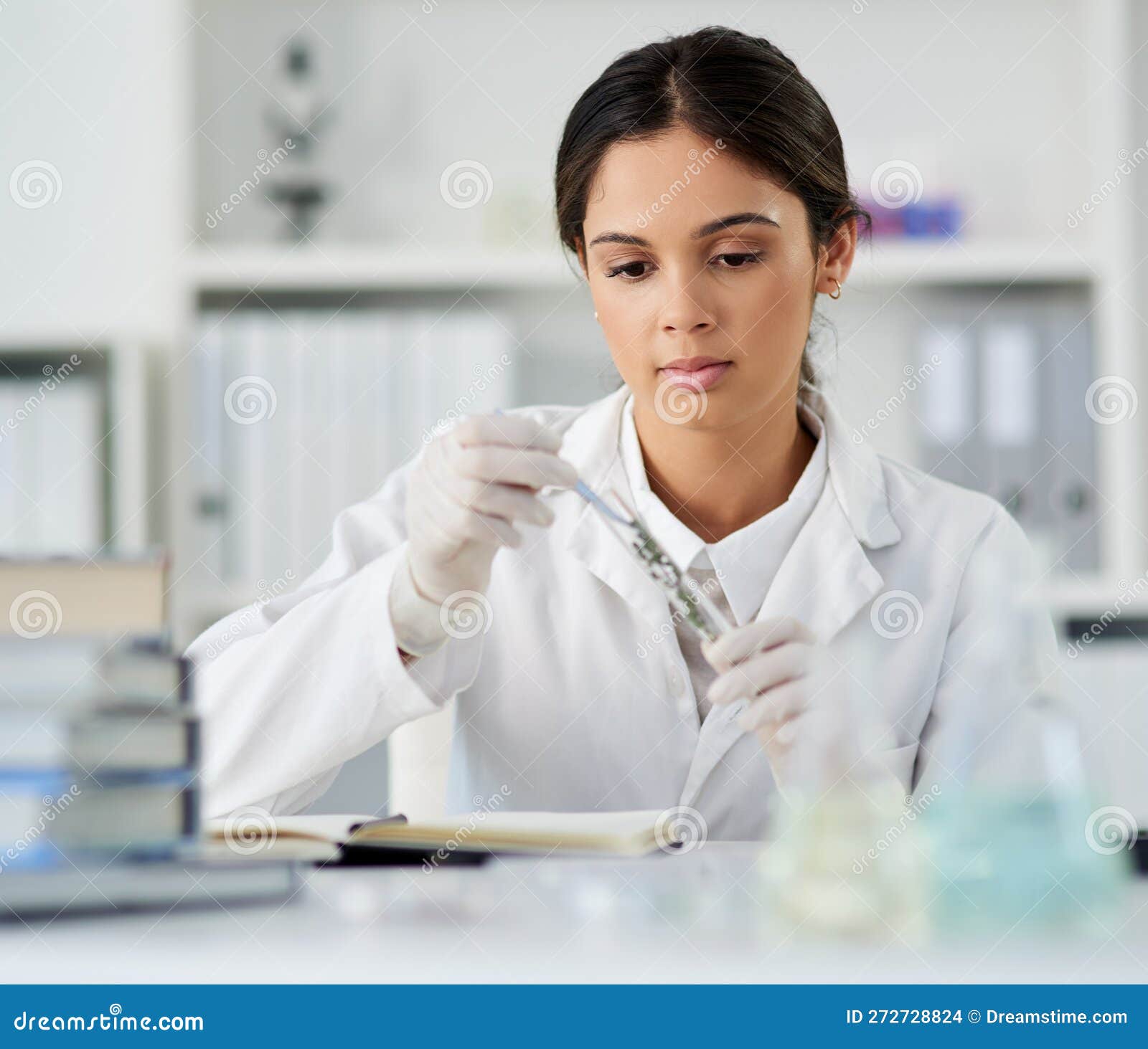 Ill Set these Aside for Testing Later. a Young Scientist Working with ...