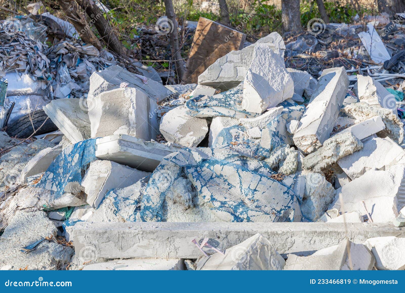 Illegal Dump of Construction Waste. Concrete Debris, Plastic Netting ...