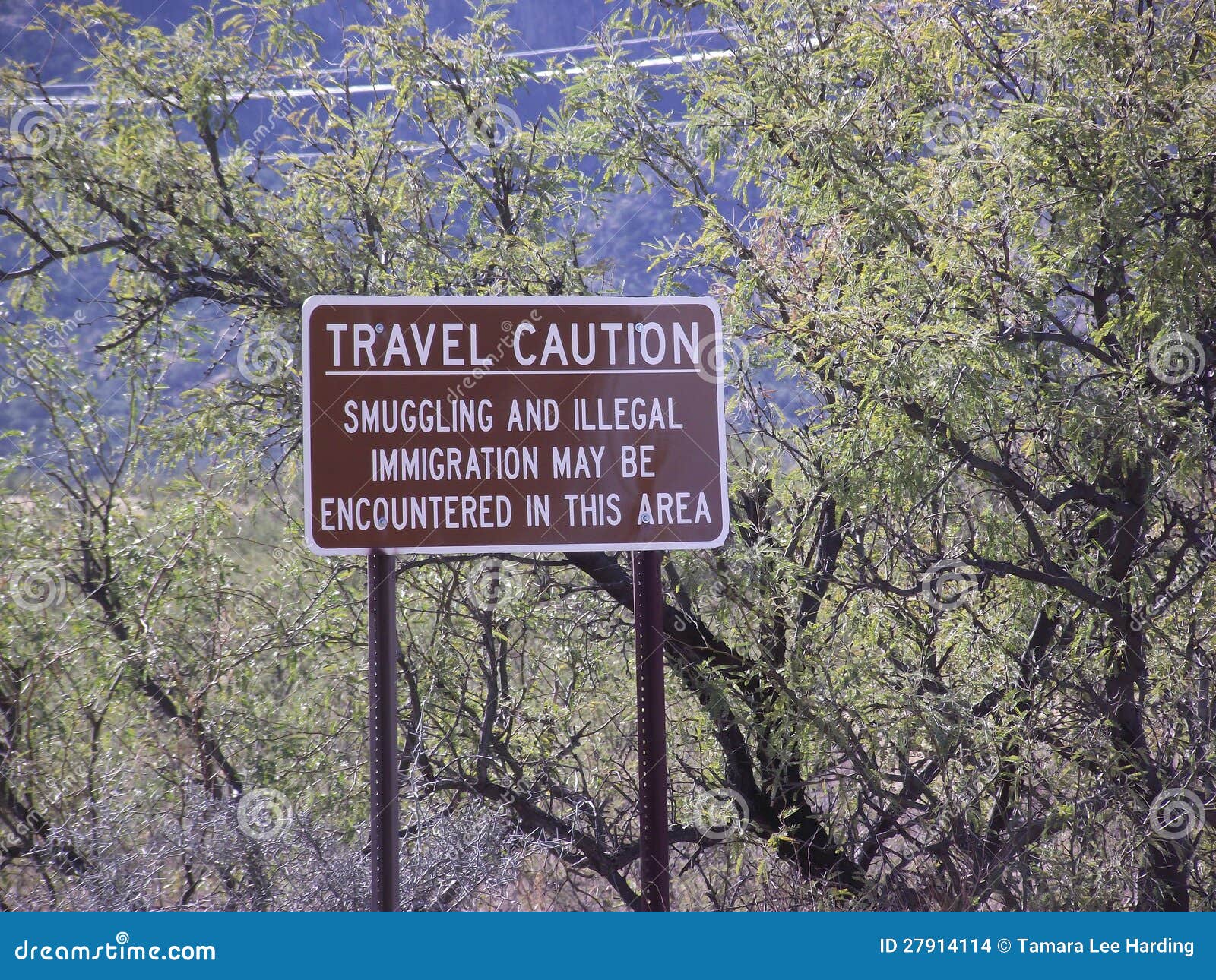 Illegal Immigration Road Sign Stock Photo - Image of smuggle, brown ...