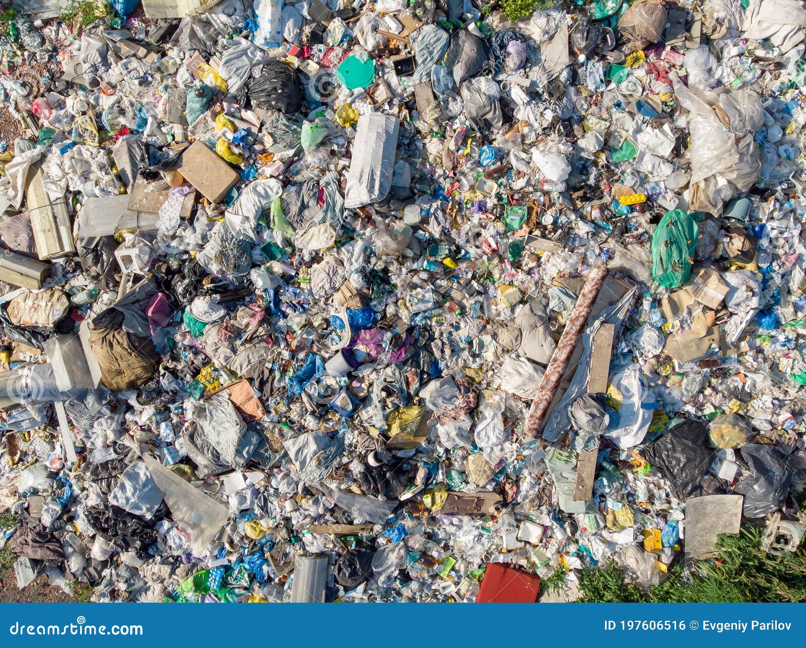 Land Pollution With Plastic Bottles And Bags. Open Storage Of Solid ...