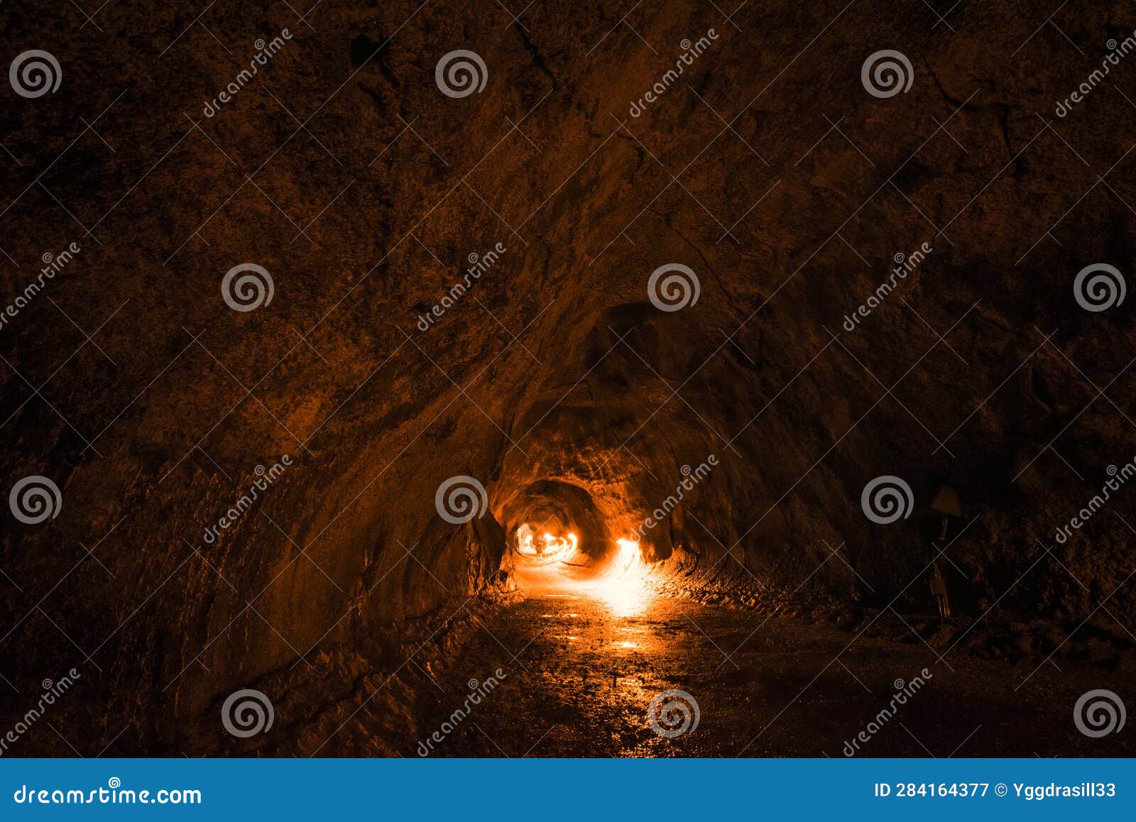 Illumated Path in Thuston Lava Tube Stock Image - Image of volcanic ...