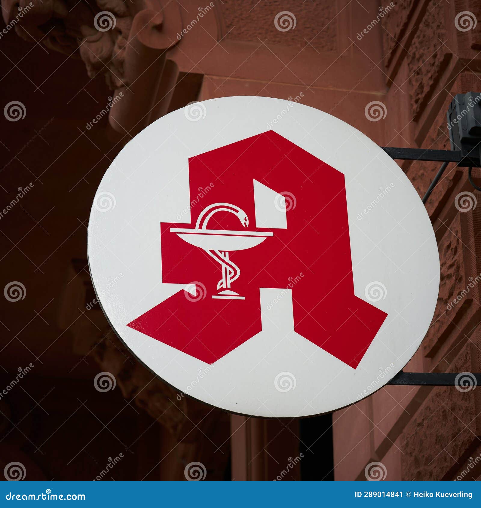 Illuminated Pharmacy Sign With Greek Symbol And Arabic Text Editorial ...