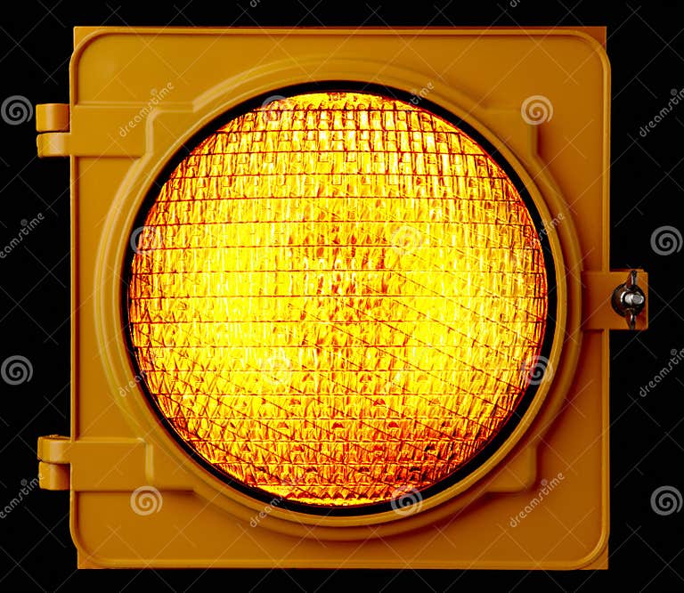 Illuminated Amber Traffic Light Stock Image - Image of glass, safety ...