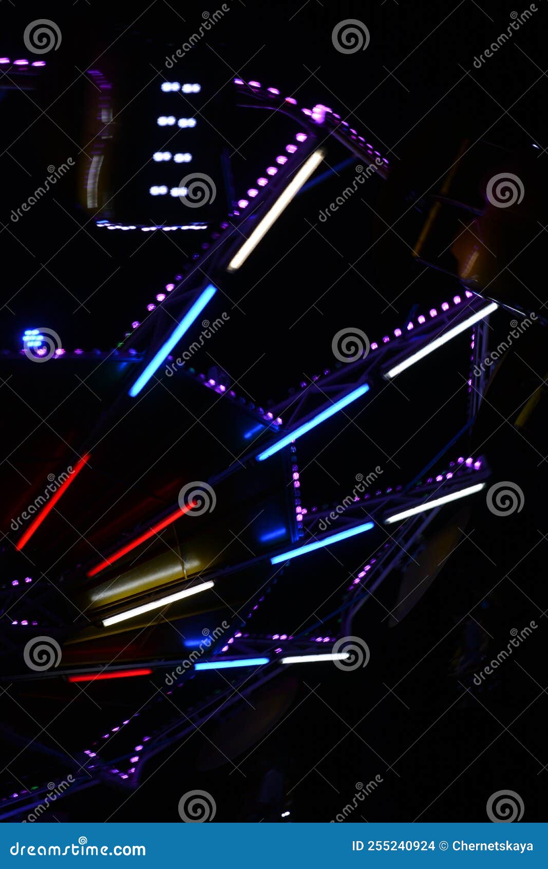 Illuminated Attraction in Amusement Park at Night Stock Photo - Image ...