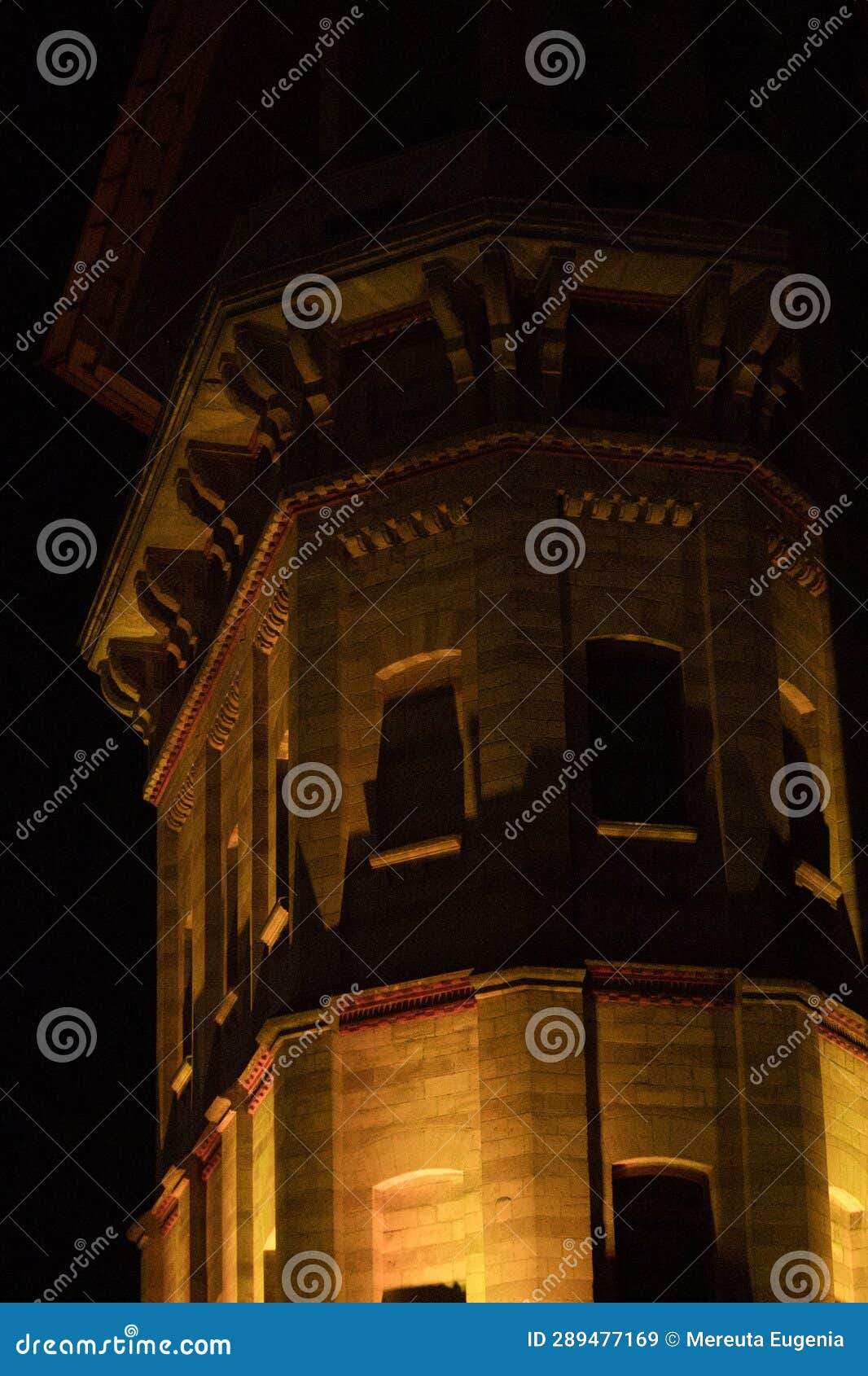 Illuminated from Below a Large Stone Tower in the Dark Stock Image ...