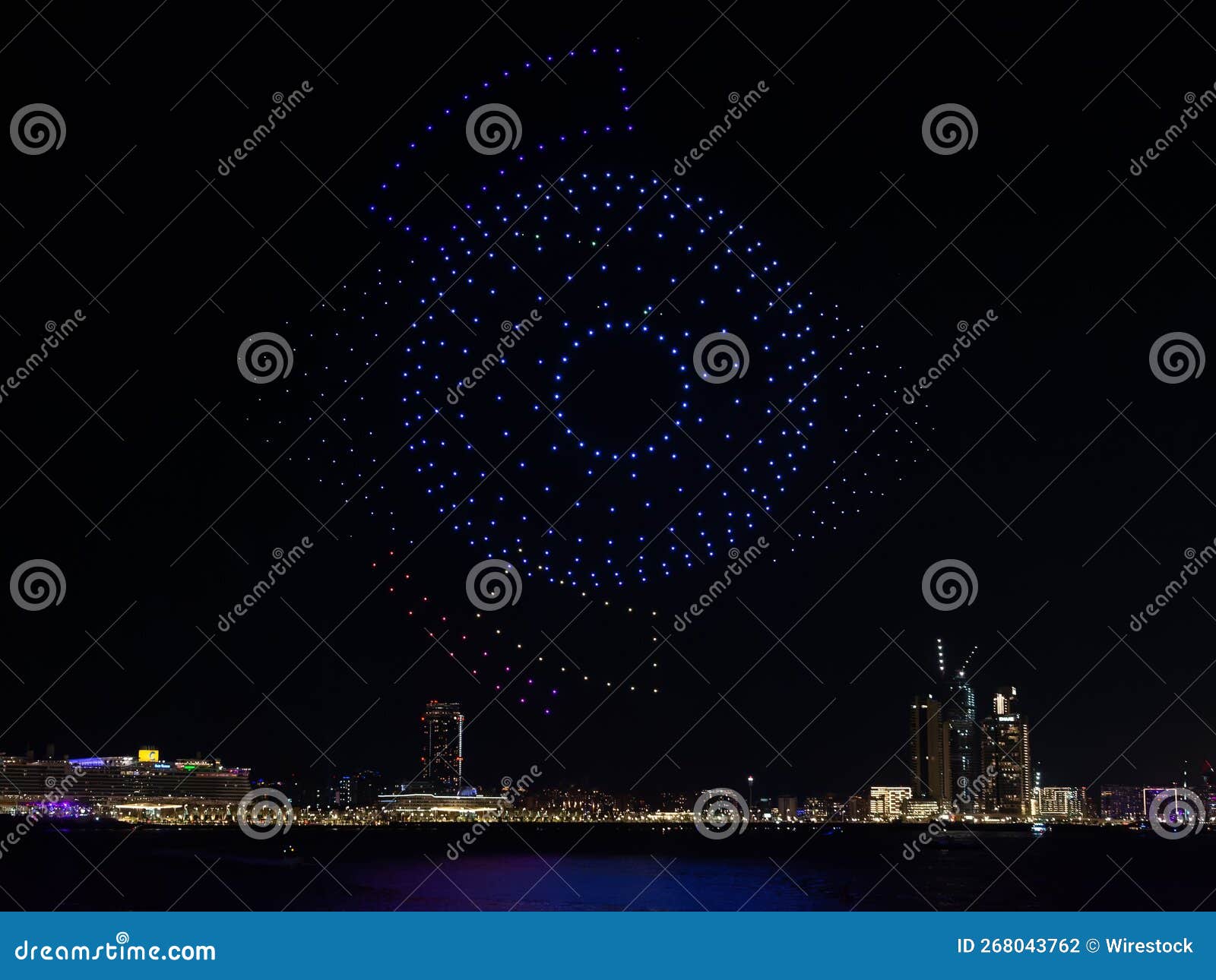 Drones Forming A Dynamic Light Show In The Night Sky Stock Photo ...