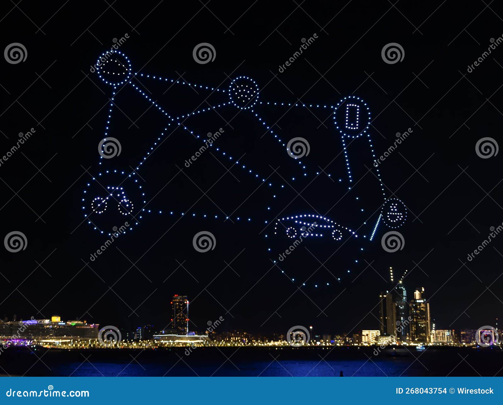 Illuminated Blue Drones Glowing in the Black Night Sky and Forming ...