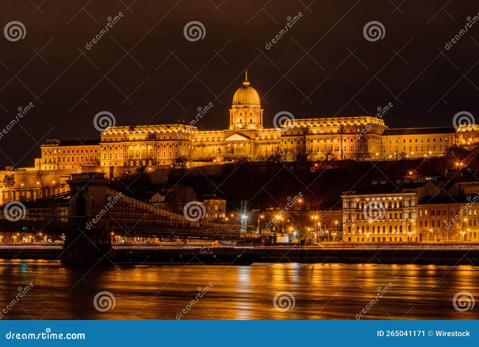 Illuminated Buda Castle at Night Above the Danube River in Budapest ...