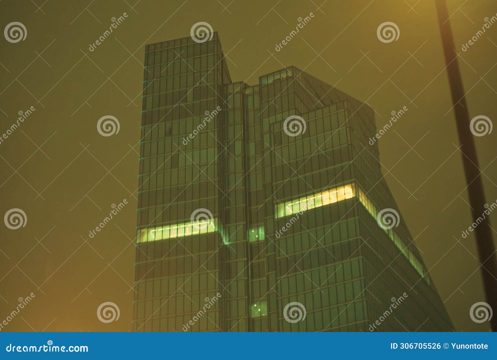 Illuminated Building. Light in the Windows of a Skyscraper. Skyscraper ...