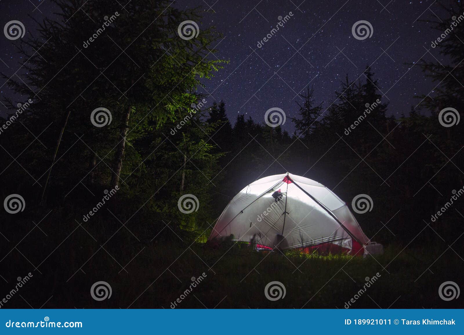 Illuminated Camp Tent at Night. Dark Night Sky with Stars Breaking ...