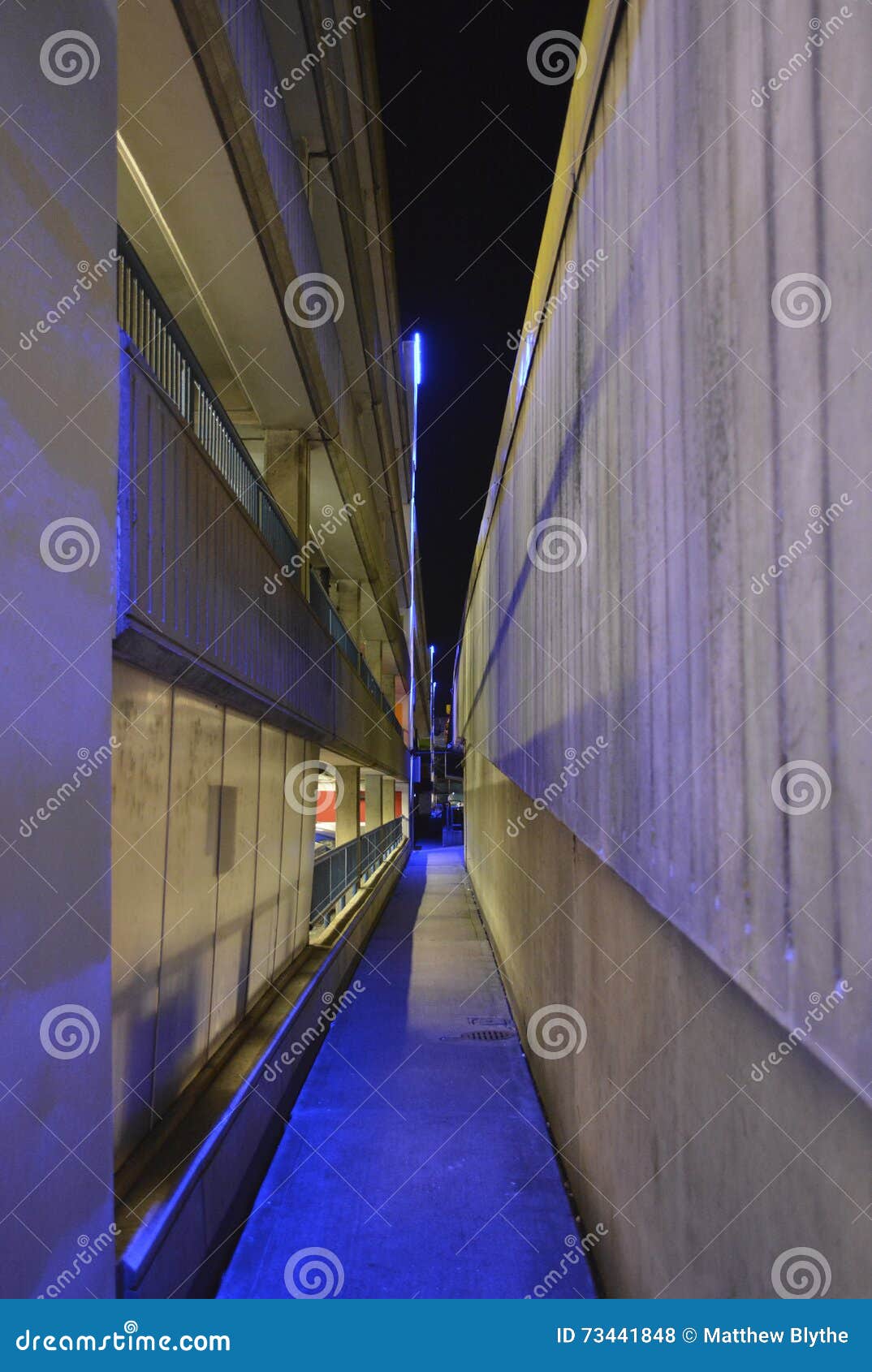 Illuminated Car Park Path at Night Stock Photo - Image of blue, narrow ...