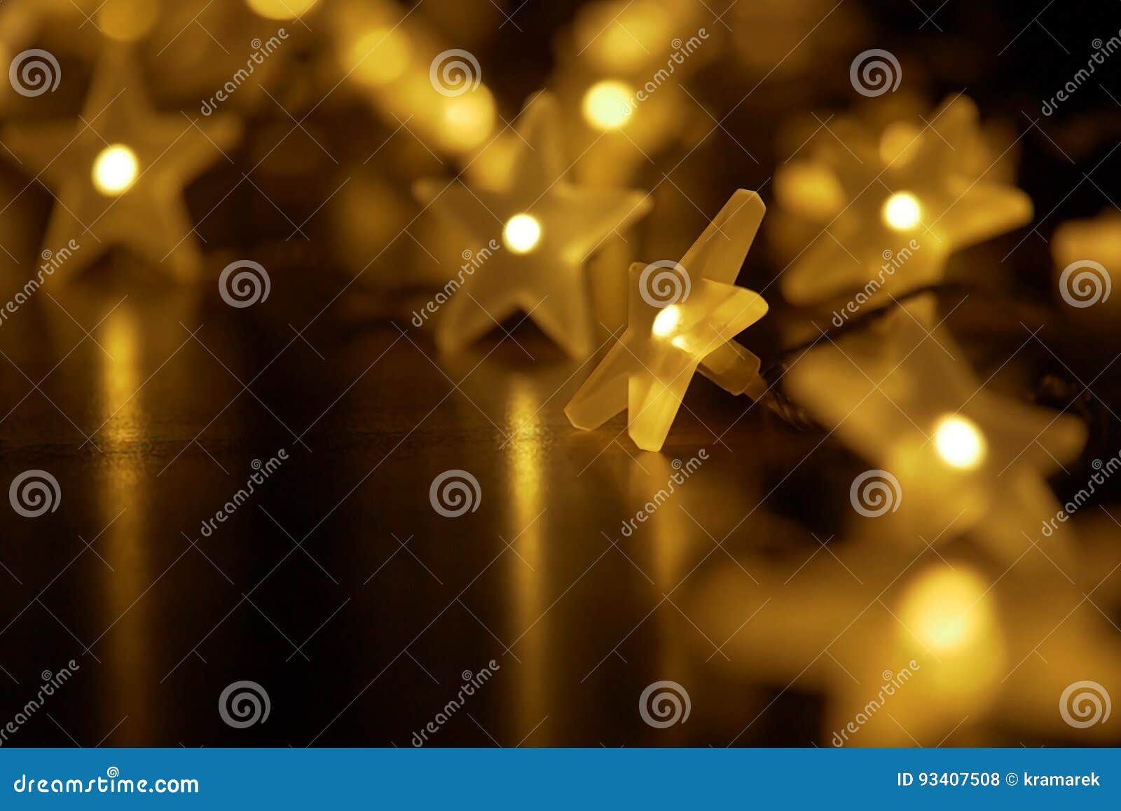 Illuminated Chain of Starry Lights in Festive Atmosphere Stock Photo ...