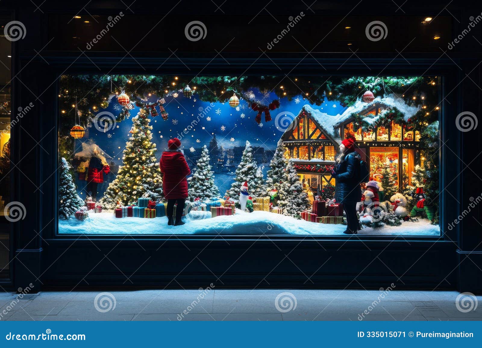 Illuminated Christmas Window Display with Snow and Festive Decorations ...