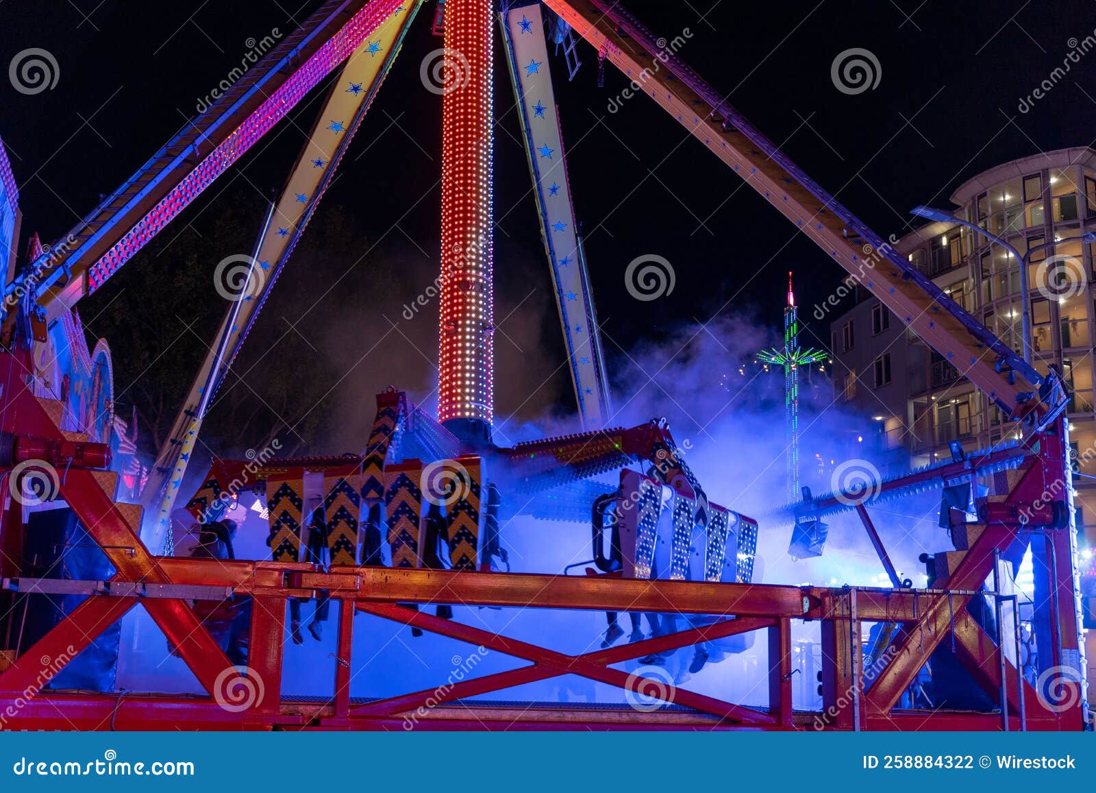 Illuminated Colorful Attraction at the Fair at Night Editorial ...