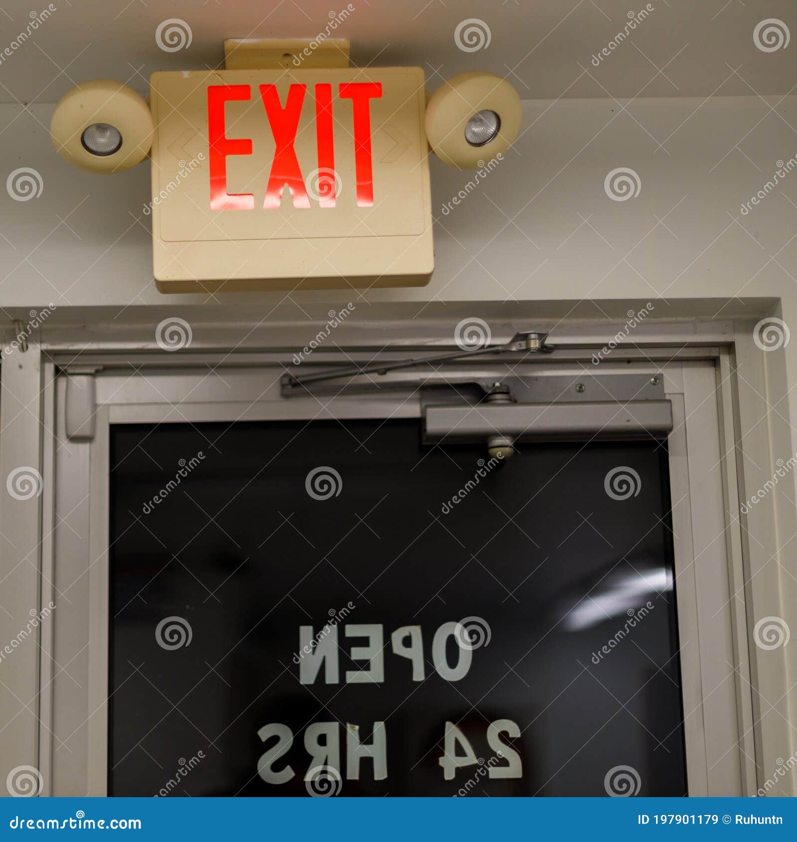 Illuminated Exit Sign Above Exterior Door Mounted on Ceiling, Mirror ...