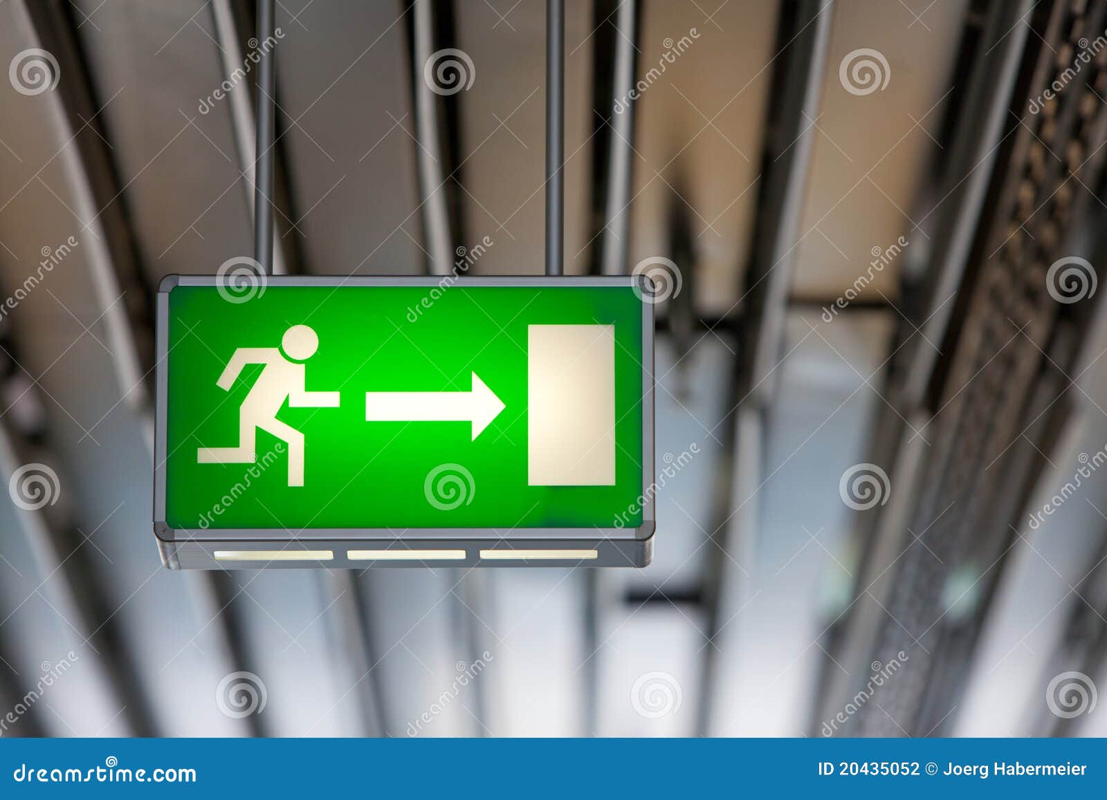Illuminated Green Exit Sign Stock Photo - Image of depart, hanging ...