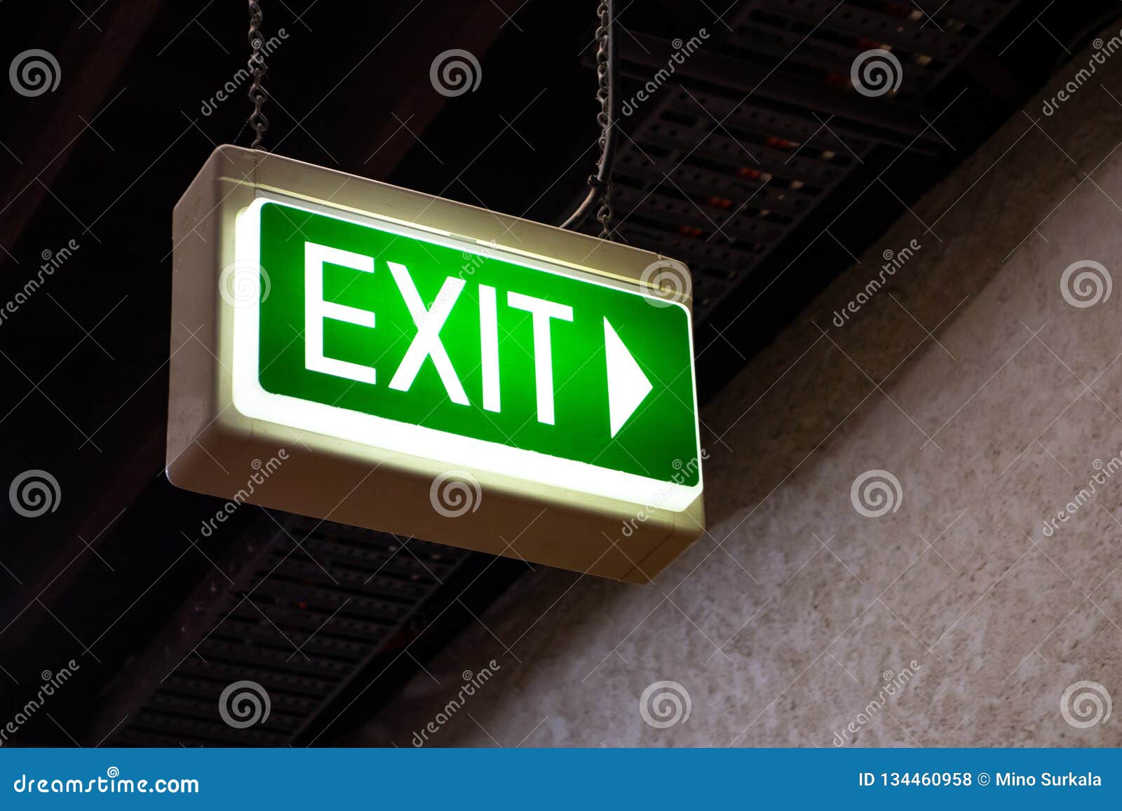 Illuminated Green Exit Sign with an Arrow Stock Photo - Image of icon ...