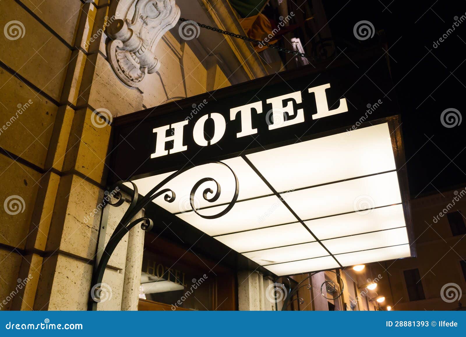 Illuminated hotel sign stock image. Image of building - 28881393