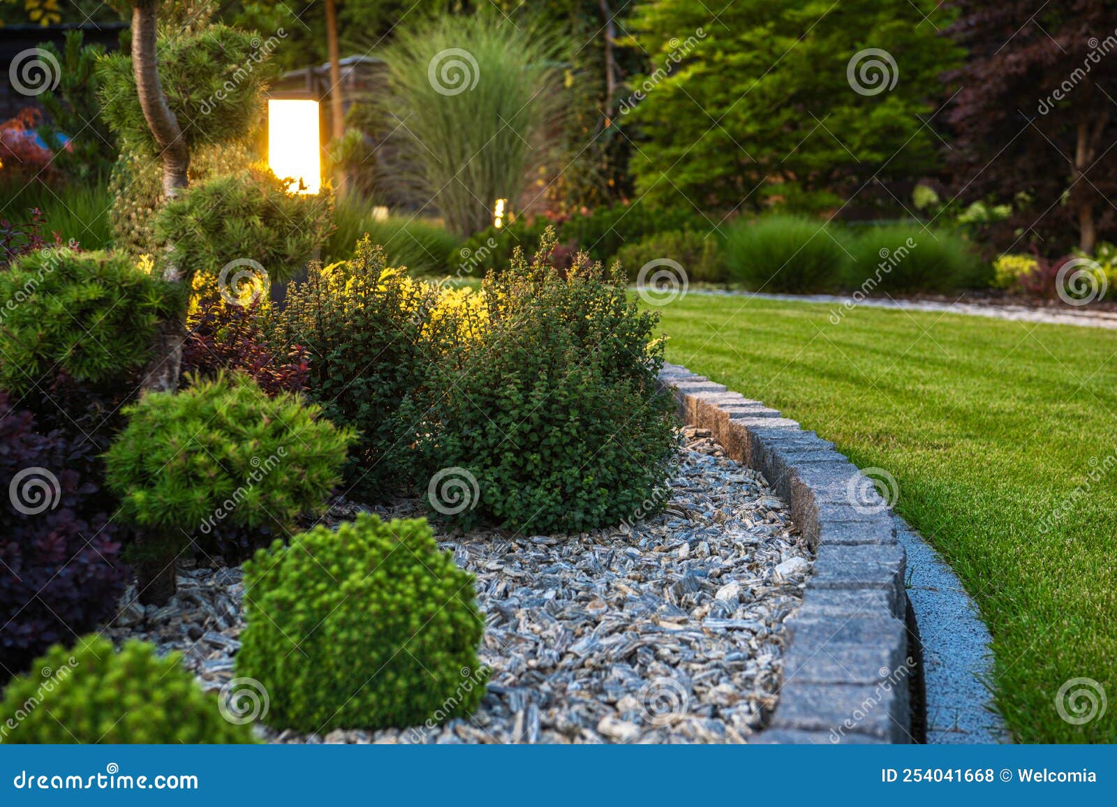 Illuminated by LED Light Posts Backyard Garden Stock Photo - Image of ...