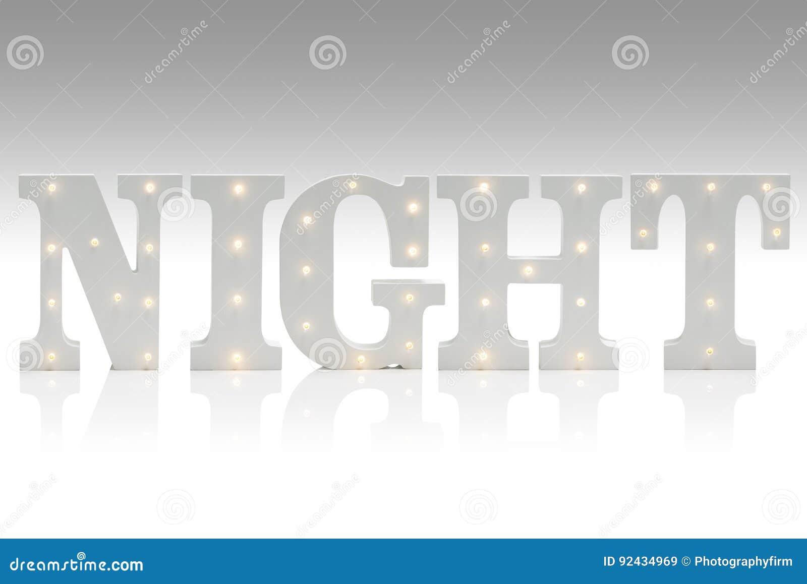 Illuminated Letters Spelling NIGHT Over Gradient Gray-White Back Stock ...