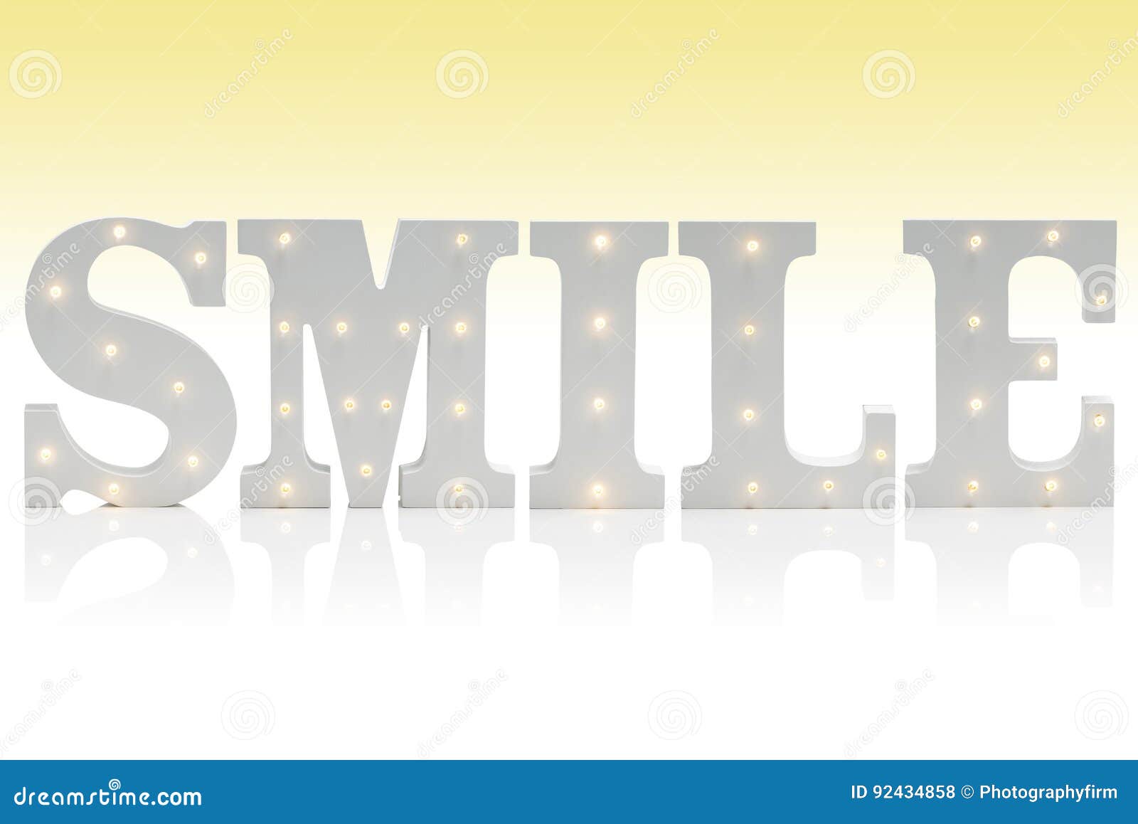 Illuminated Letters Spelling SMILE Over Gradient Yellow-White Ba Stock ...
