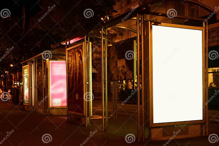 Illuminated Lightbox and Ad Panel at Busstop. Night Image. Stock Image ...