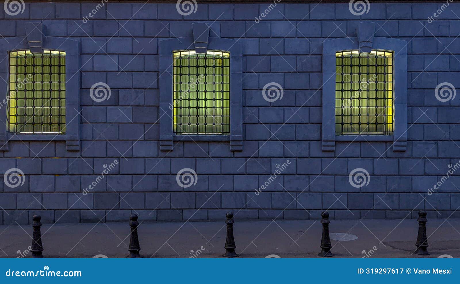 Illuminated Louvered Windows at Dusk Stock Image - Image of dusk, night ...