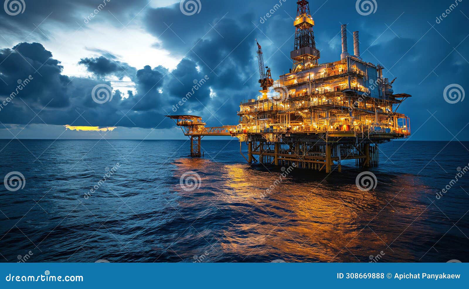 Illuminated Offshore Oil Platform Working through the Night Stock ...