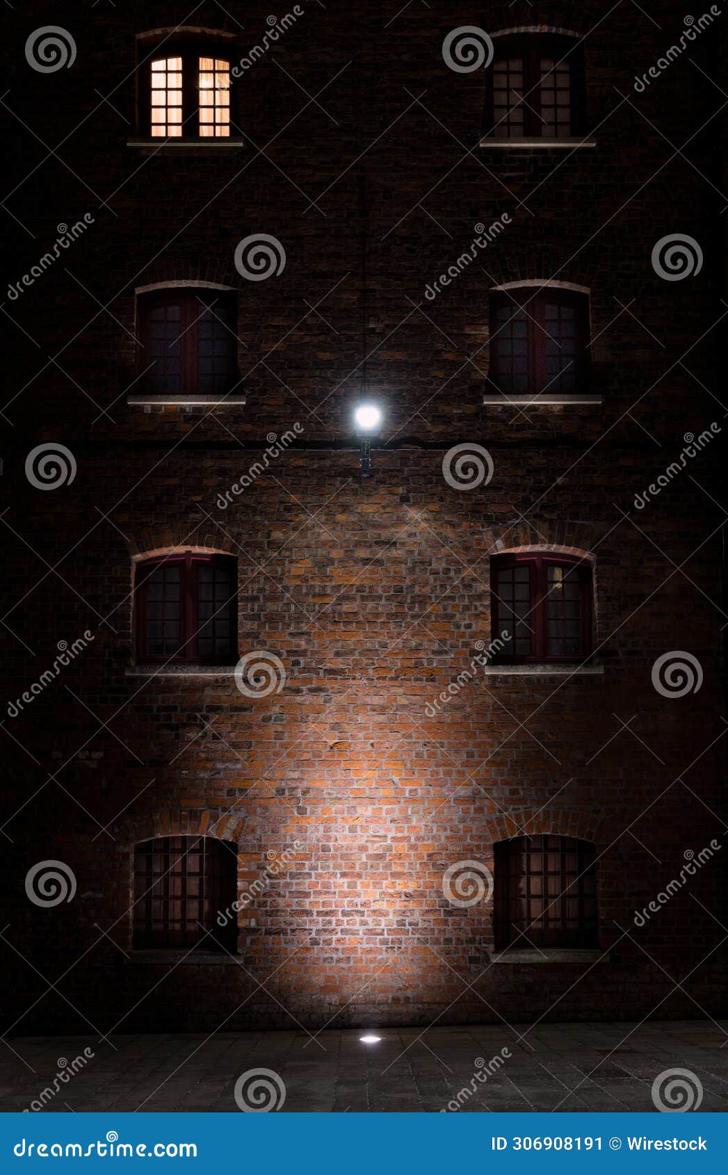 Illuminated Old Brick Building at Night Stock Image - Image of ...