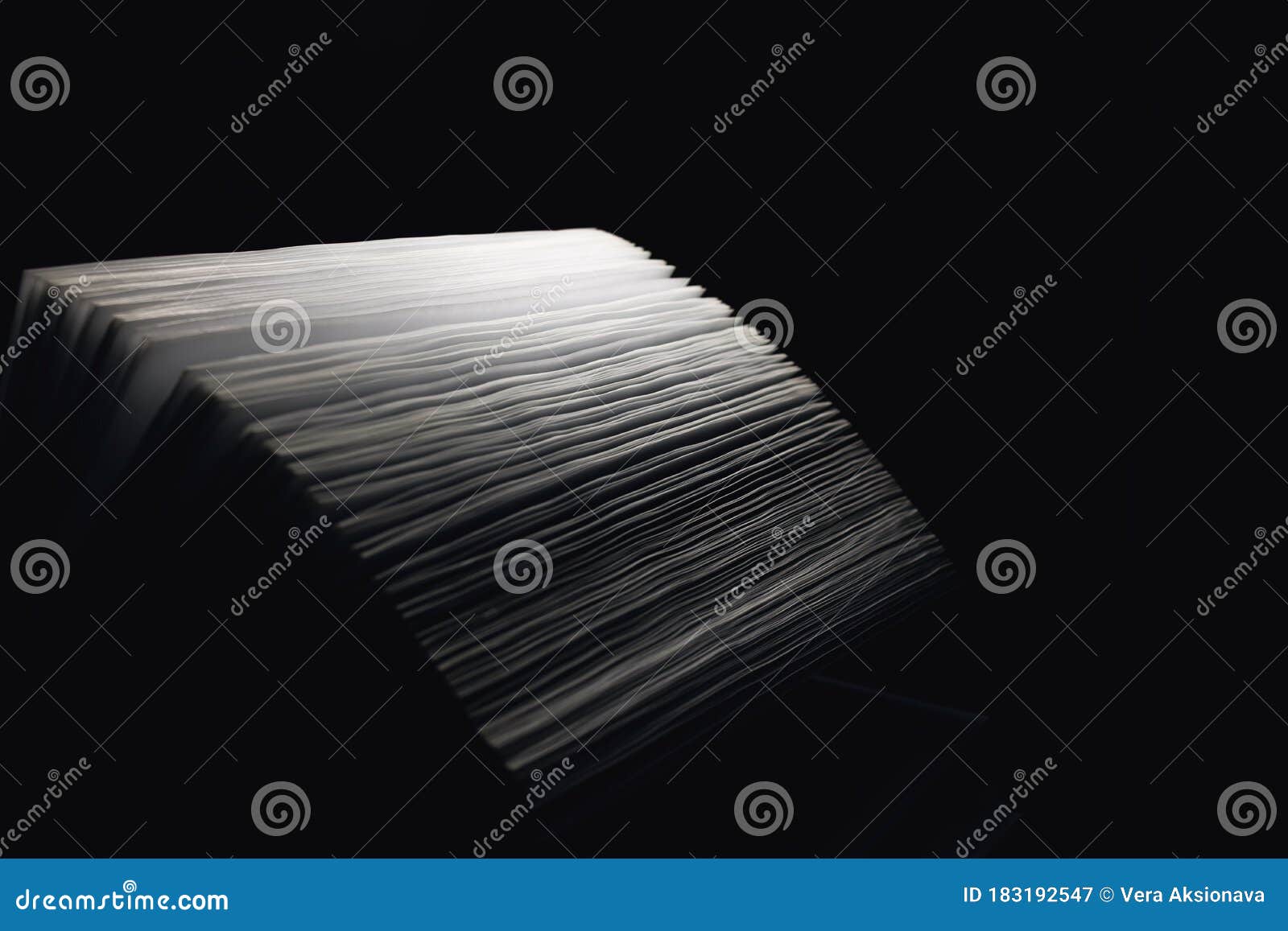 Illuminated Open Book Pages in the Dark Closeup Stock Image - Image of ...