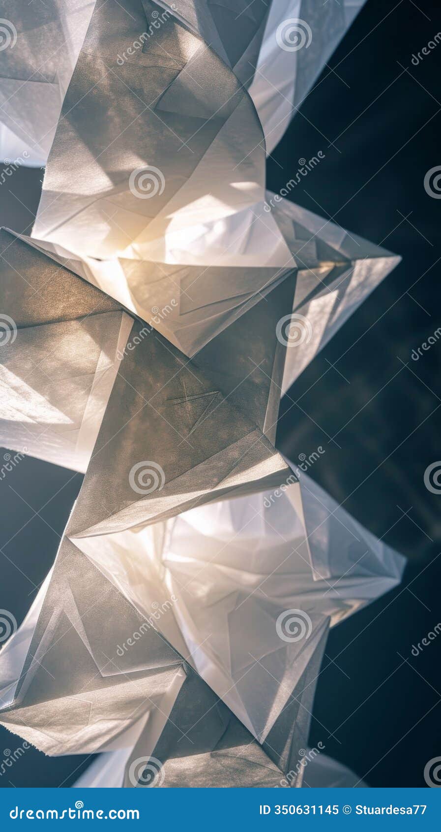 Illuminated Origami Structure with Twisting Forms Stock Image - Image ...