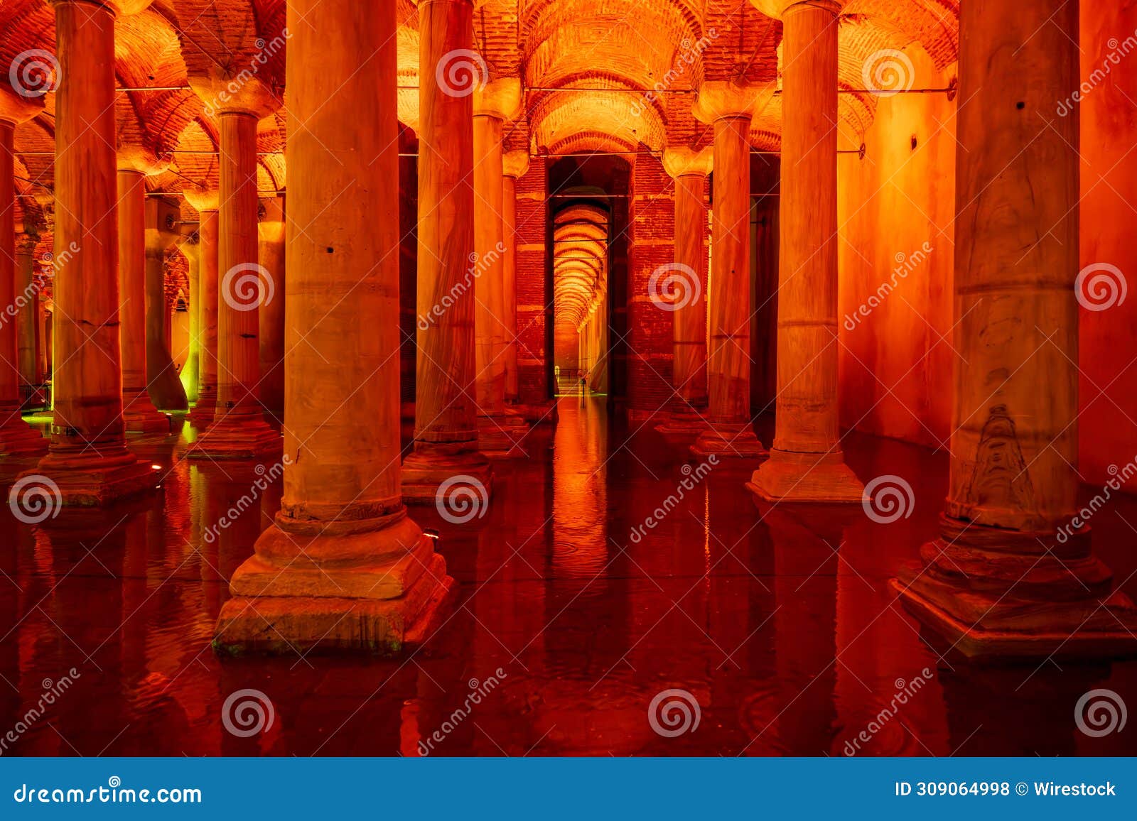 Illuminated Path Leads To a Structure with Arches and Columns in ...