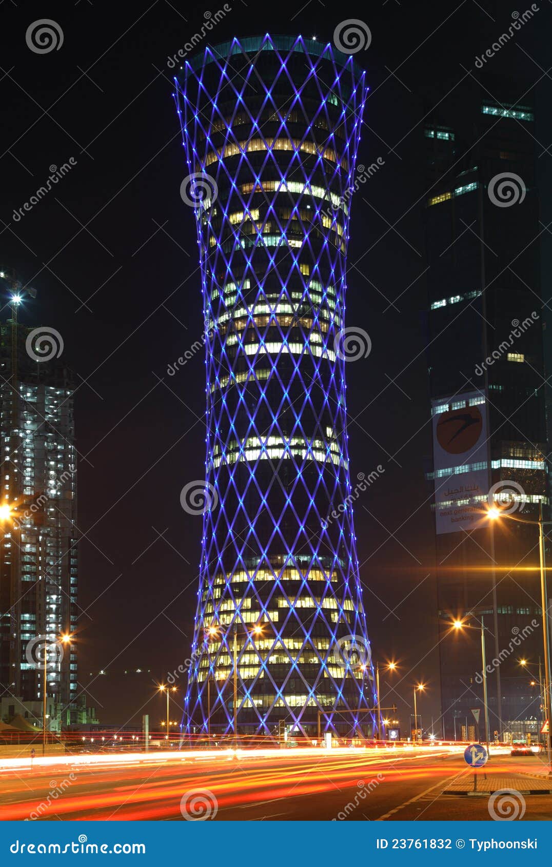 Illuminated QIPCO Tower, Doha Editorial Photography - Image of night ...