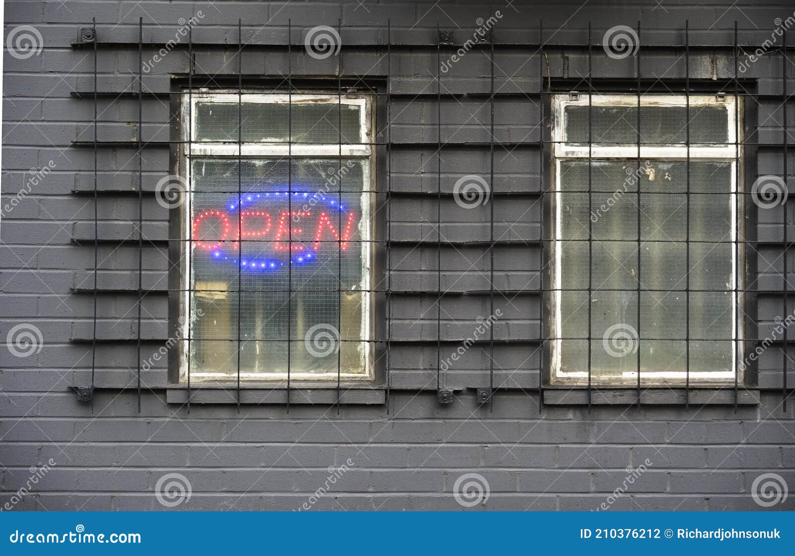 Illuminated Red Open Sign on Shop Window Stock Photo - Image of blue ...