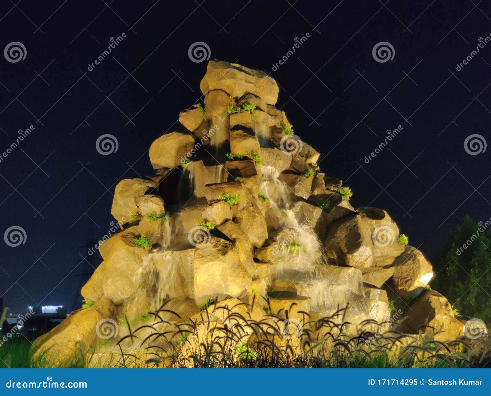 Illuminated rocks at night stock image. Image of night - 171714295