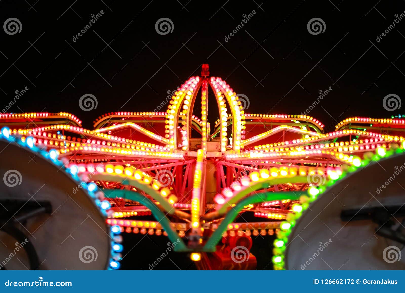 Rotating Device in Amusement Park Stock Photo - Image of night ...