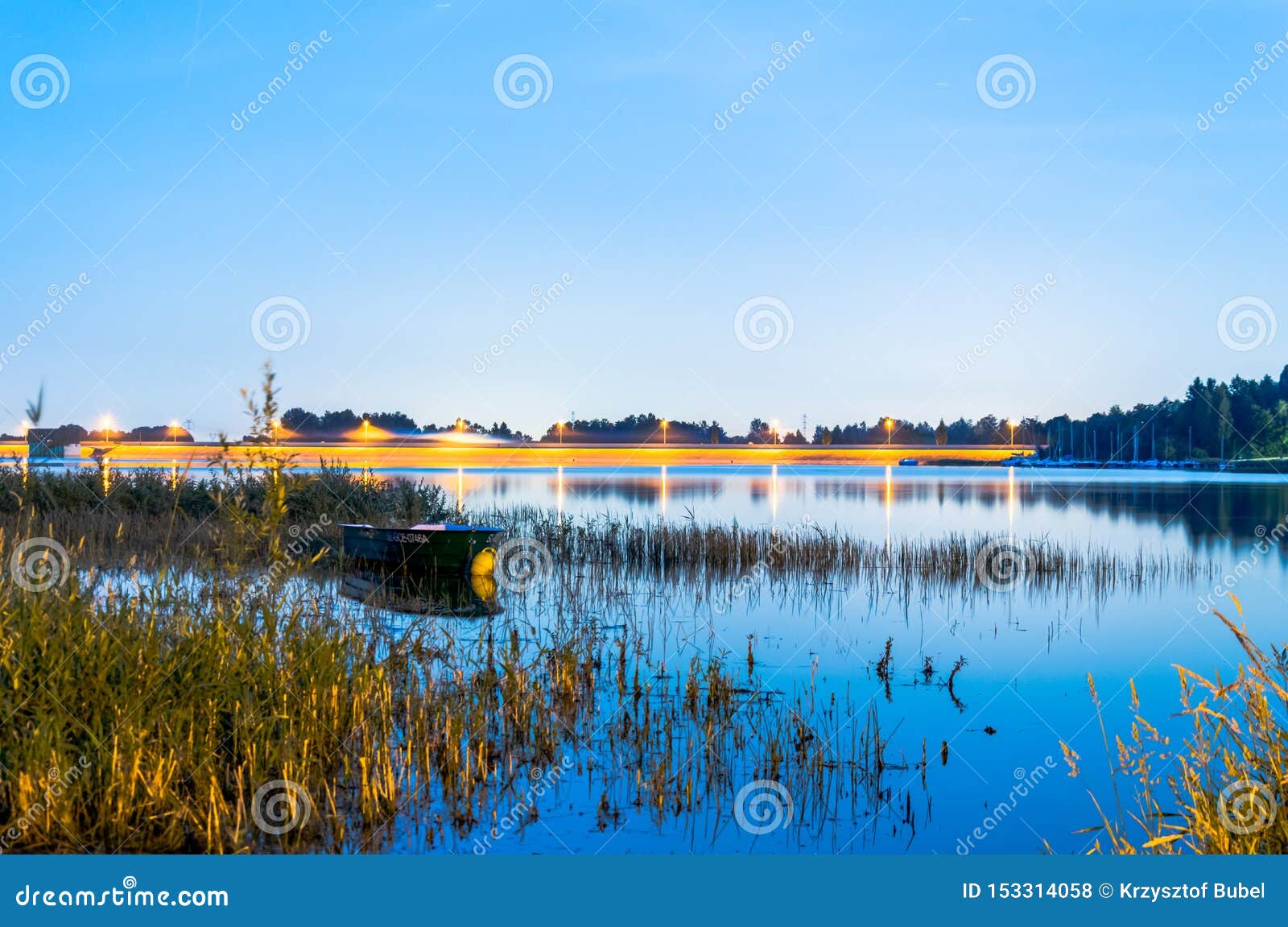 Illuminated Rowboat at a Lake at Night Stock Photo - Image of beautiful ...