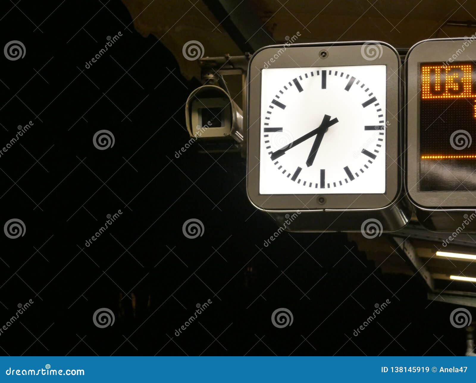 Illuminated Station Clock, in the Evening on the Platform of a Subway ...