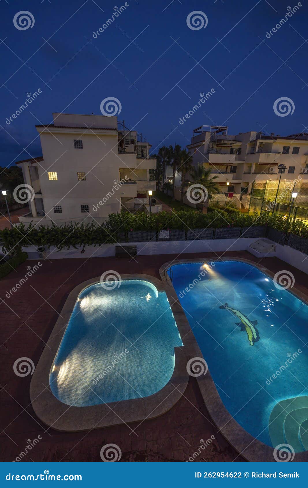 Illuminated Swimming Pools at Night Stock Photo - Image of alcoceber ...
