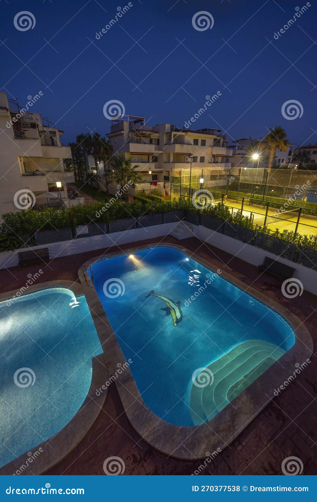 Illuminated Swimming Pools at Night Stock Photo - Image of mansion ...