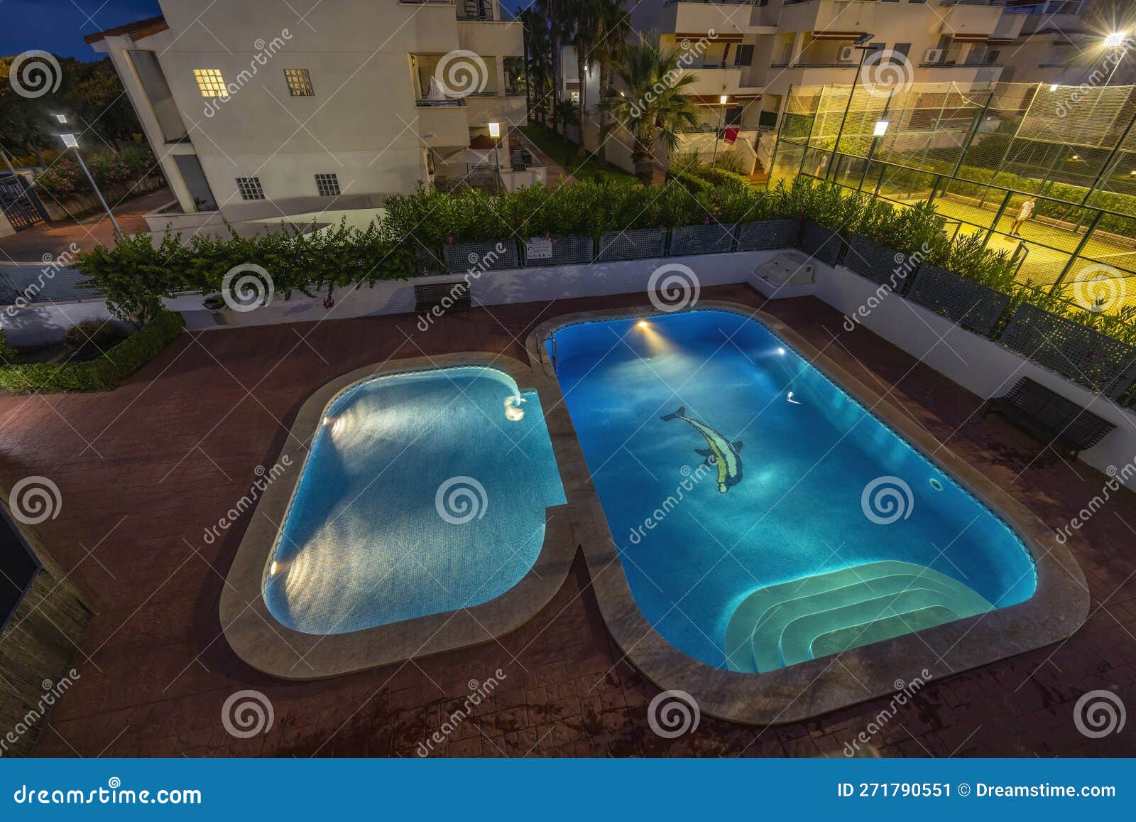 Illuminated Swimming Pools at Night Stock Image - Image of apartment ...