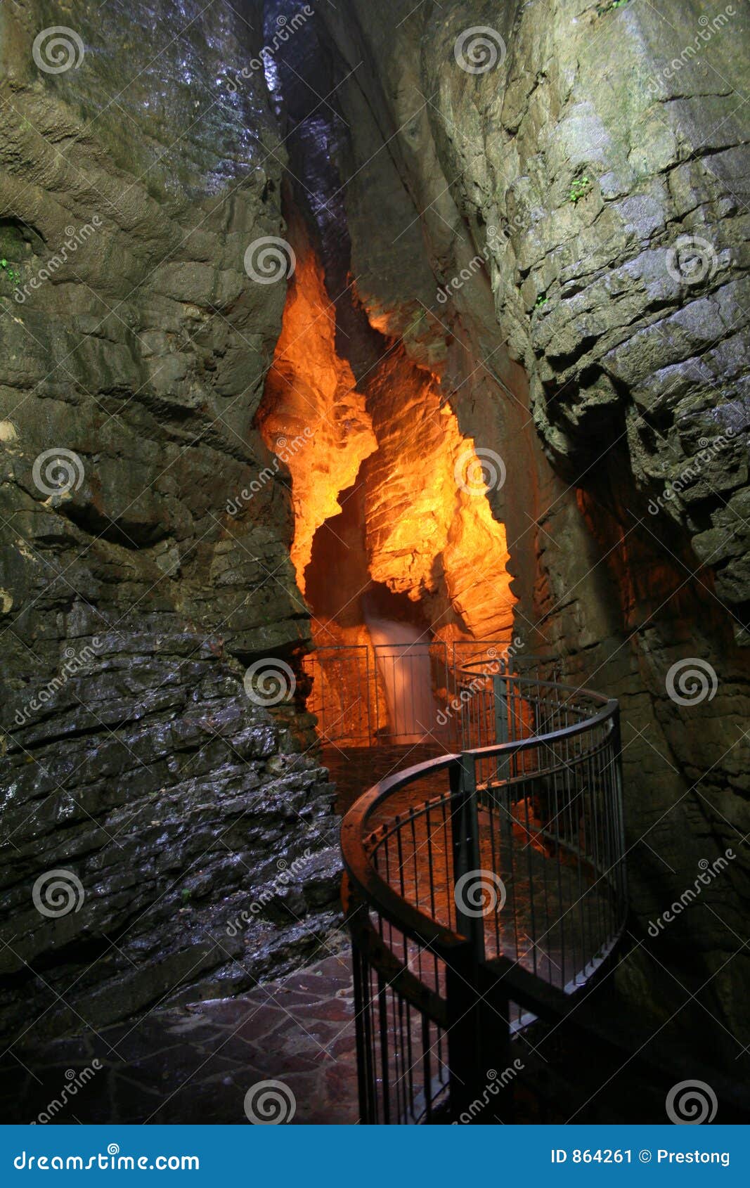 Illuminated Underground Waterfall. Stock Image - Image of handrail ...