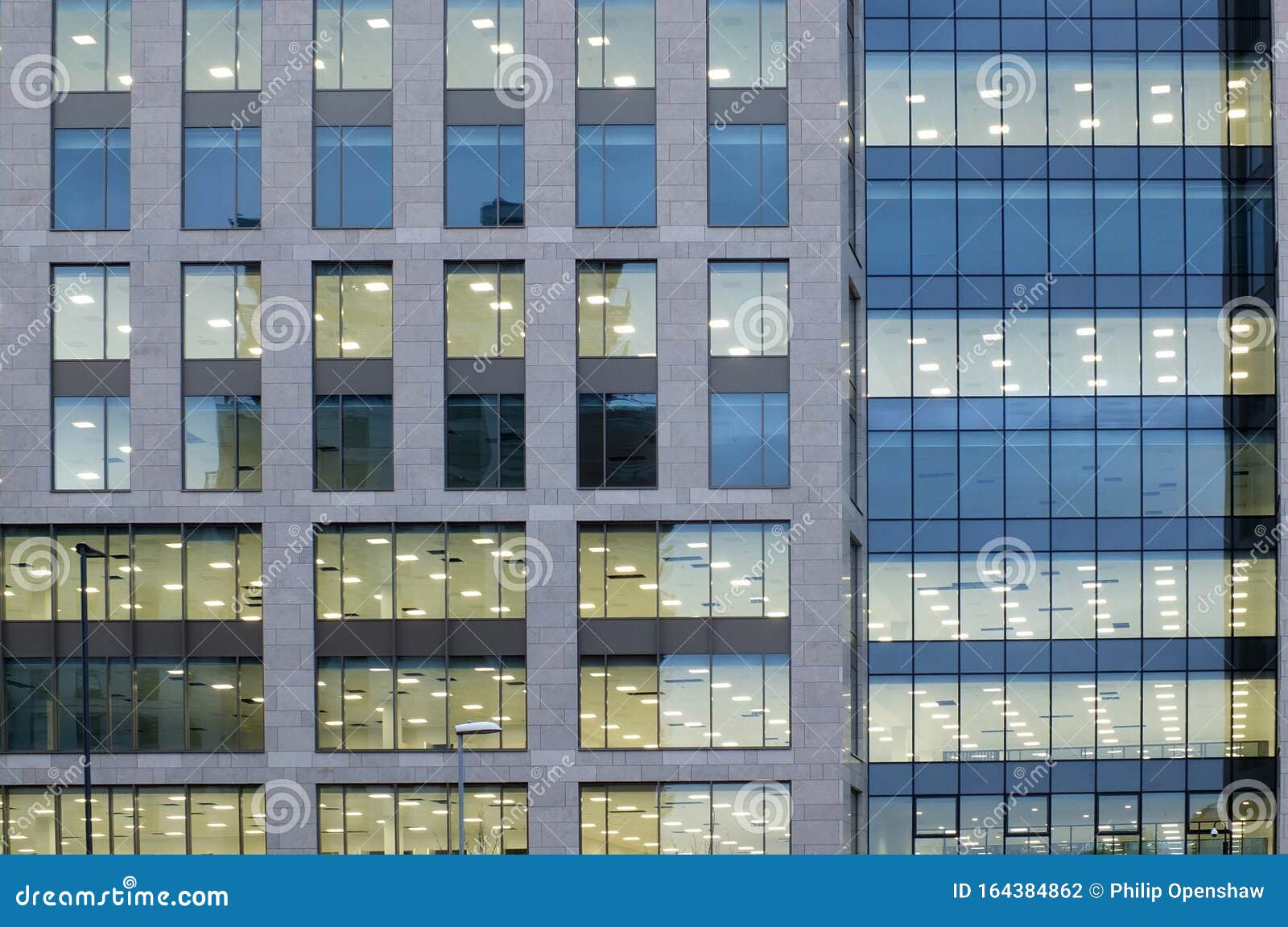 Illuminated Windows on the Facade of a Large Modern Office Building ...