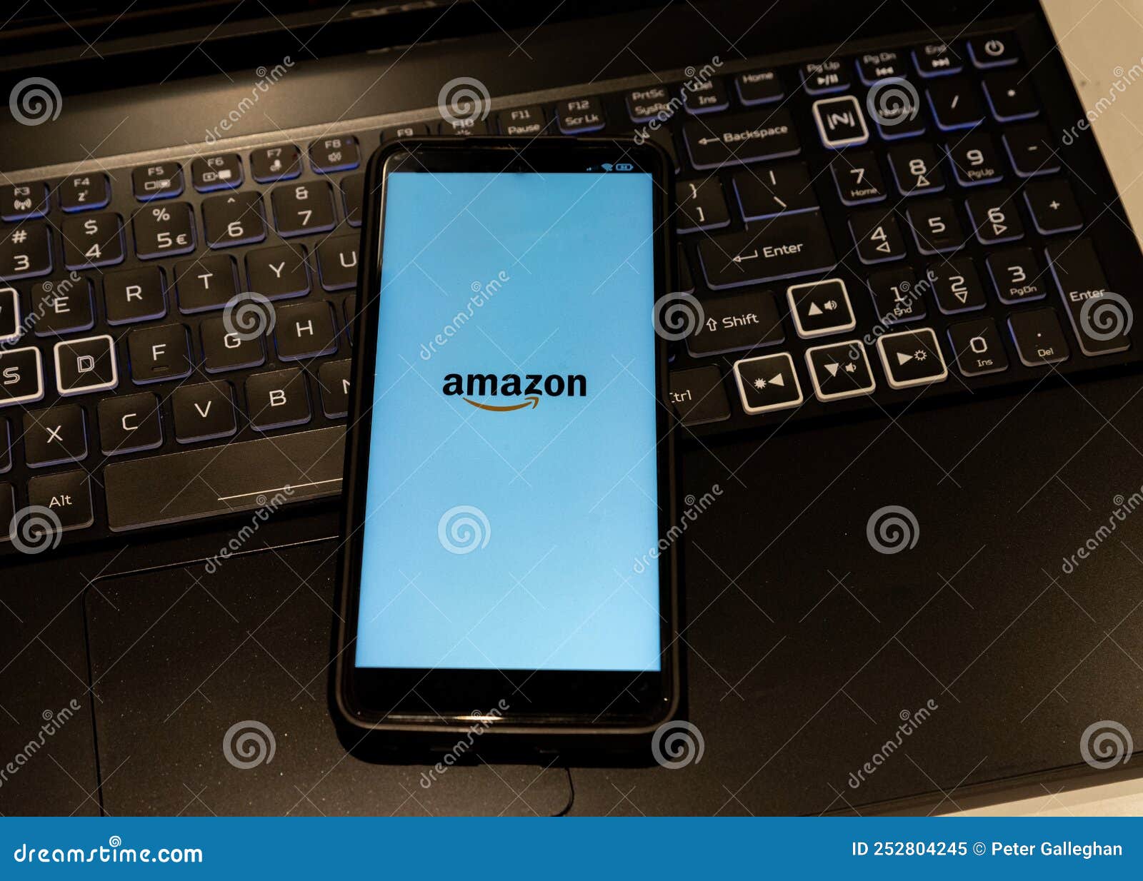 Illustration of the Amazon Logo Displayed on a Smartphone Screen ...