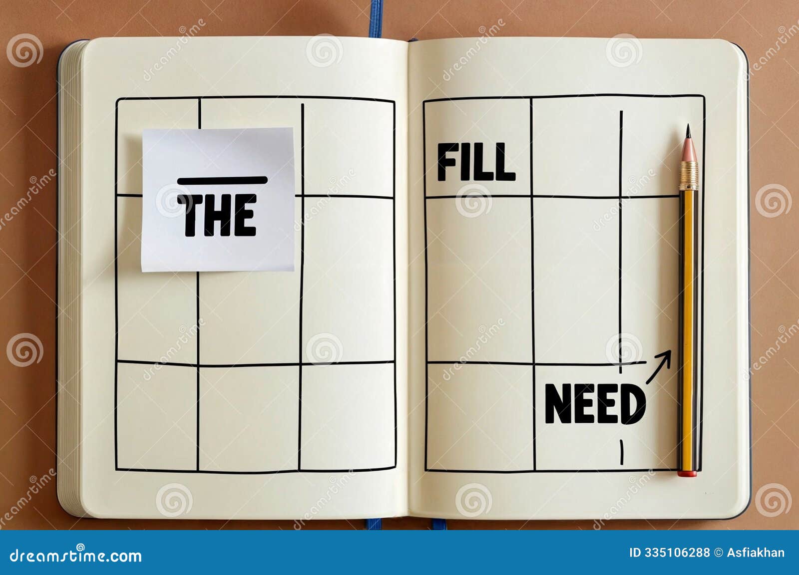 Pencil and Book with Two Open Pages Displaying the Text Words "FILL the ...